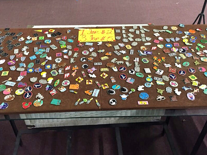 Pin collectors, prepare to lose your minds! This table display is like social media in physical form&mdash;tiny pieces of personality ready to adorn your jacket.