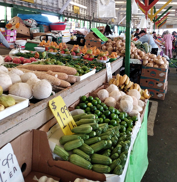 Vegetable tetris at its finest. These vibrant zucchini, melons, and tropical treasures make grocery store produce look like pale imitations. 