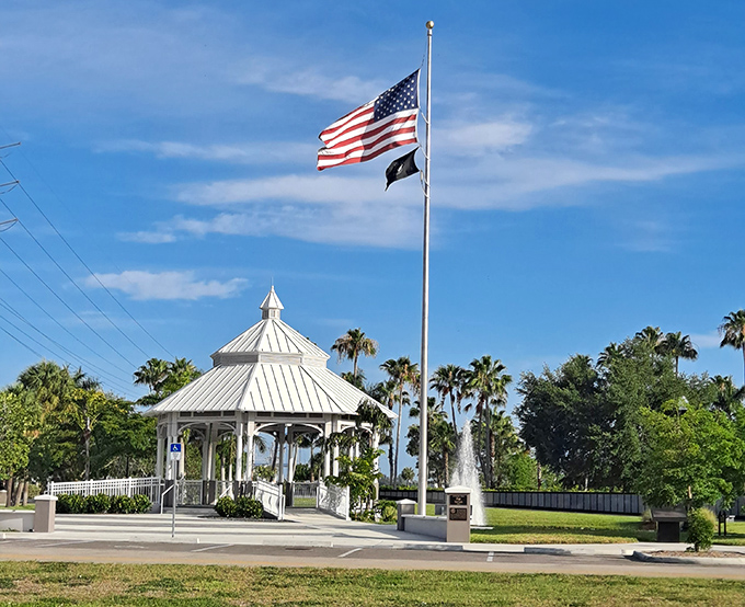 The gazebo at Veterans Park stands like a graceful sentry, where patriotism and peaceful reflection coexist under Florida's impossibly blue skies.