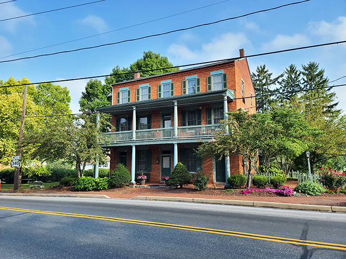 This brick inn with its welcoming porch practically begs you to sit a spell, perhaps with lemonade in hand, watching the world slow down.