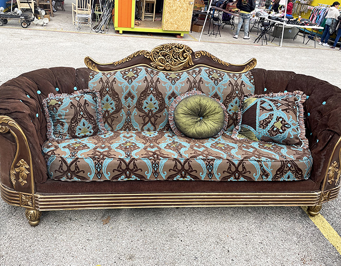 This ornate sofa has more personality than most reality TV stars and probably better stories.