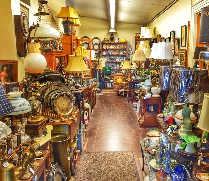 Lamp heaven! Where lighting fixtures from every era compete for attention like contestants in a particularly elegant beauty pageant.