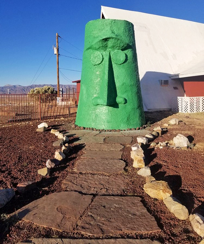 The ceremonial approach to the green sentinel feels like you're about to meet an oracle&mdash;one that dispenses wisdom about the perfect road trip snacks.