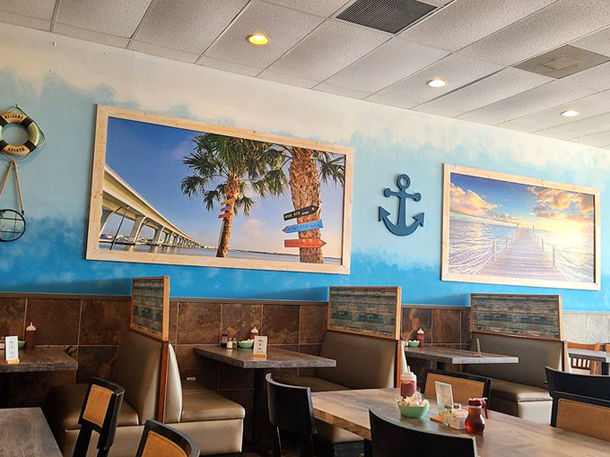 Ocean blues and maritime treasures transform a simple wall into a coastal getaway&mdash;breakfast with a side of vacation vibes.