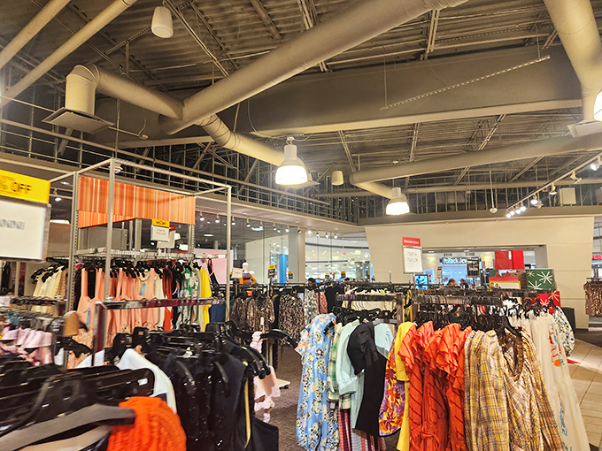The natural habitat of the wild bargain hunter. Notice their methodical approach to the clothing racks, a technique perfected over years of outlet expeditions.