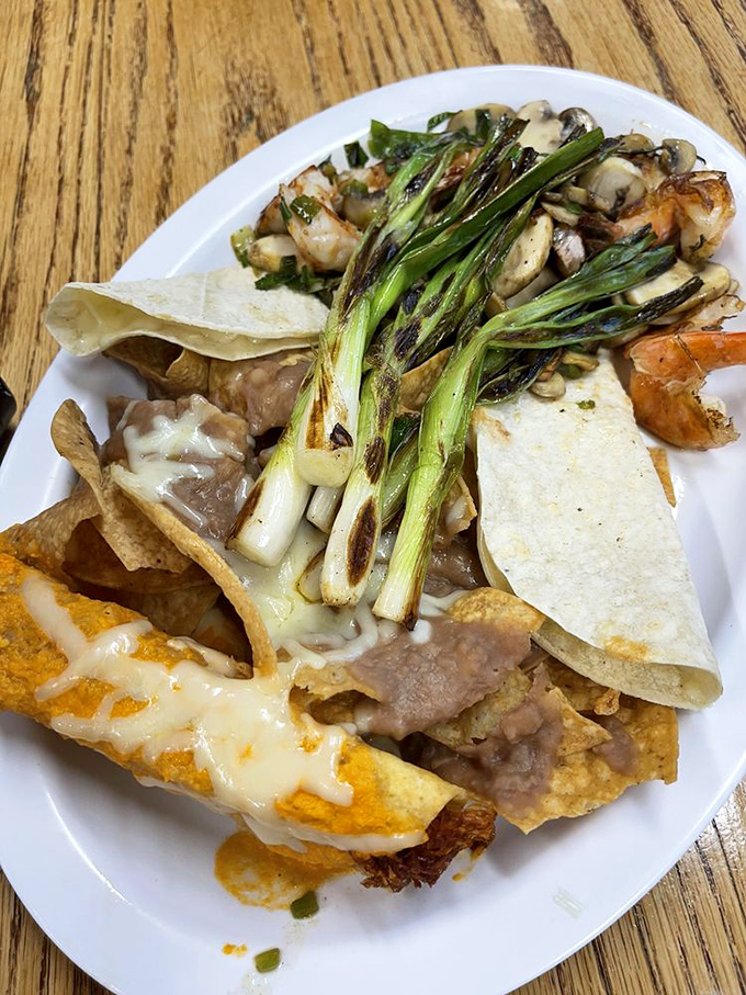 This isn't just a plate&mdash;it's a fiesta of textures and flavors where grilled green onions and tortillas dance together in perfect harmony.