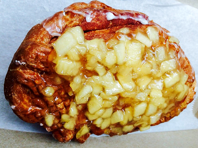 The apple fritter &ndash; a massive, irregularly-shaped wonder studded with cinnamon-spiced apple chunks that's more edible art than mere pastry.