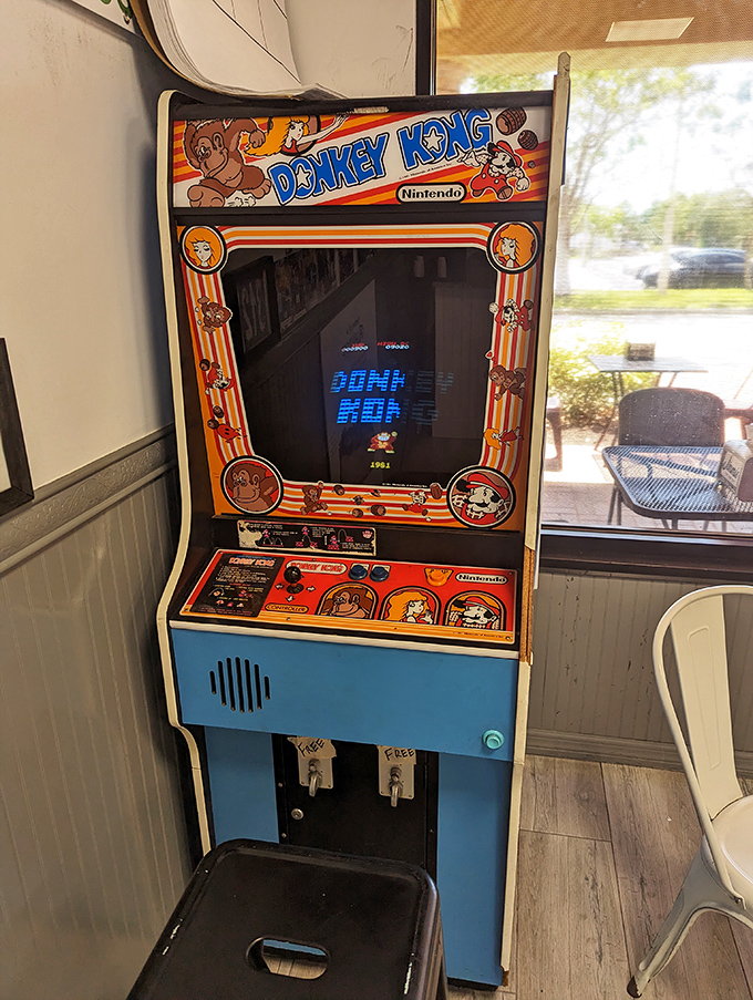 Nothing says "we take our food seriously, but not ourselves" like a vintage Donkey Kong machine waiting to entertain you between bites.
