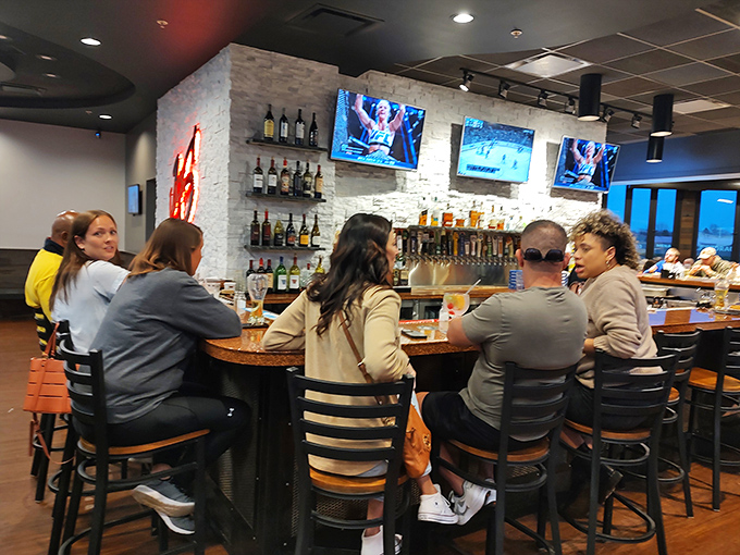 The bar area strikes that perfect balance between "I'm here to watch the game" and "I'm celebrating something special," with enough TVs to keep everyone happy.
