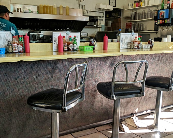 The counter seats&mdash;where regulars become family and first-timers become regulars. Watch culinary magic happen while perched on these chrome thrones.