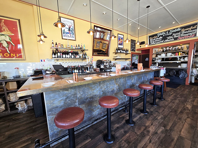 The bar where strangers become friends over glasses of Bordeaux. Those leather stools have heard more food confessions than a priest.