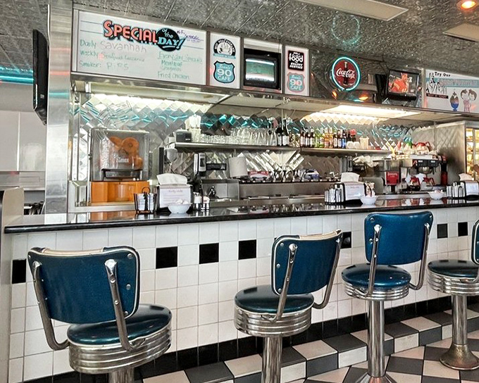 At this counter, strangers become friends over coffee refills, and the staff remembers your order before you've even decided what you want.