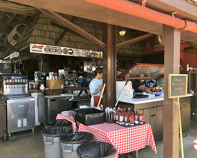 Behind every great seafood feast is a no-nonsense prep station where the magic happens, complete with those iconic red-checkered tablecloths.
