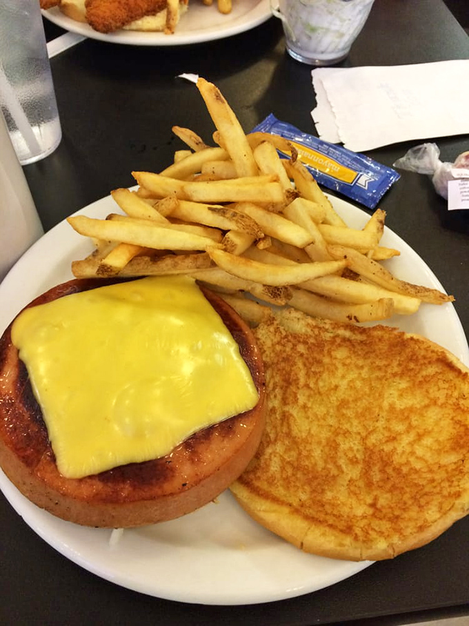 The humble bologna sandwich elevated to art form &ndash; golden-grilled bread embracing that perfectly browned meat like an old friend.