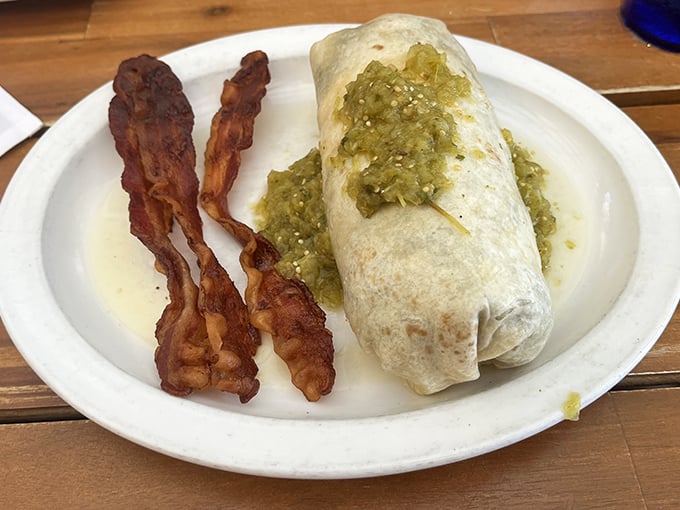 This breakfast burrito with crispy bacon isn't just a meal&mdash;it's a hand-held festival of flavors wrapped in a warm tortilla hug.