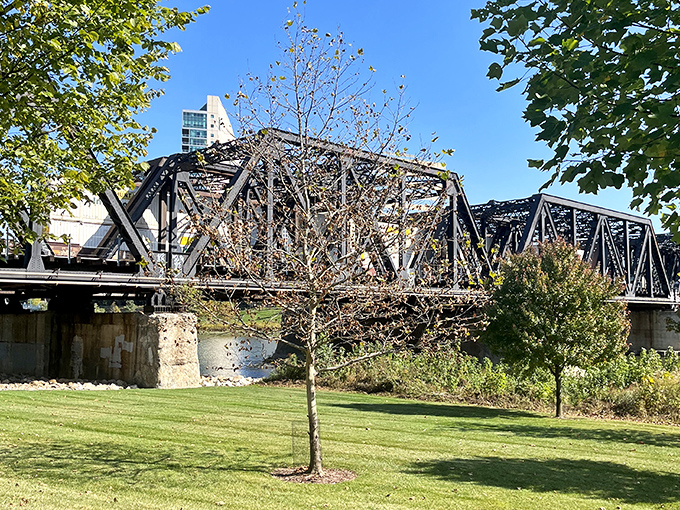 Beyond The Slingshot, Columbus' industrial heritage stands proud in the form of a classic steel bridge spanning the nearby waterway.