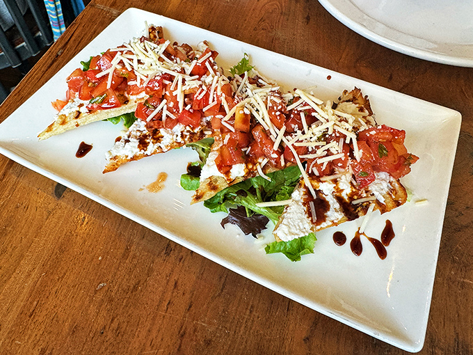 Bruschetta that makes you question everything you thought you knew about toast. Fresh tomatoes, herbs, and a drizzle that seals the deal.