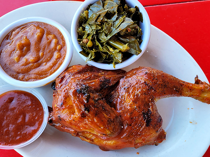 Chicken getting the royal barbecue treatment, dressed in char and ready for its close-up moment.