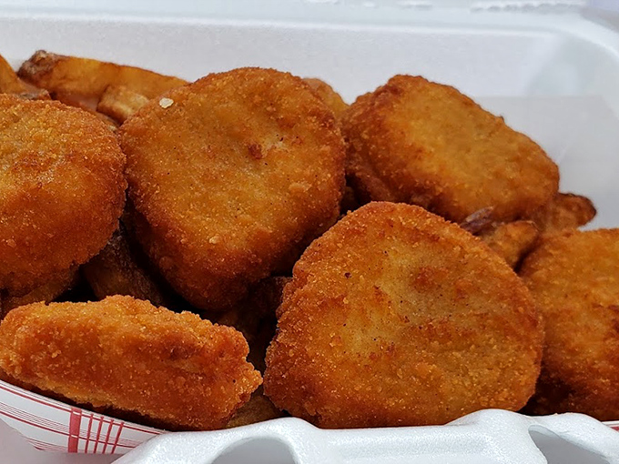 Golden-fried nuggets of joy stacked like delicious treasure. Simple pleasures done right never go out of style.