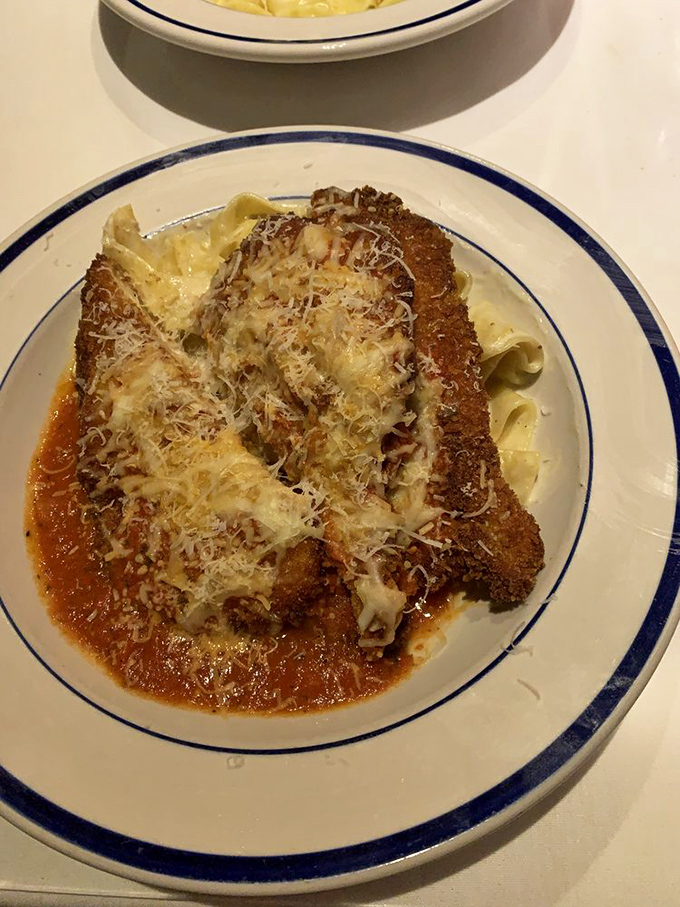 Chicken parmesan that could make an Italian grandmother nod in approval – crispy, saucy, cheesy perfection that demands a moment of respectful silence.