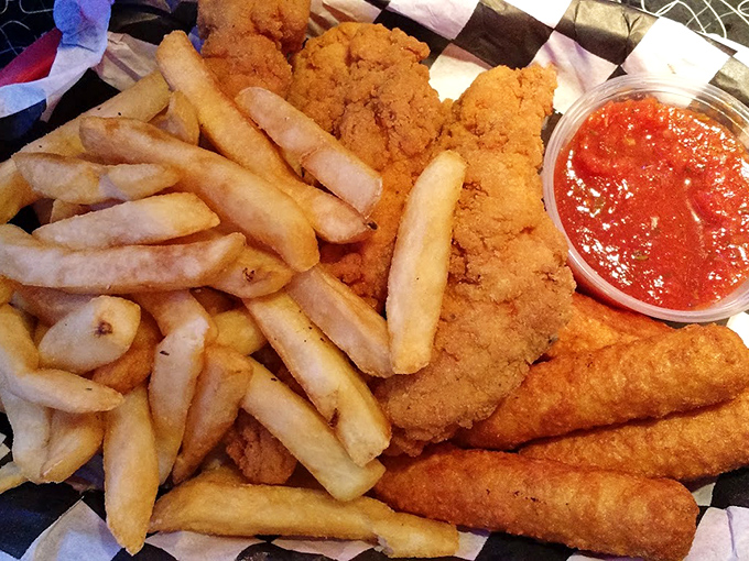 Golden-brown chicken tenders with fries crisp enough to make satisfying crunch sounds that echo across the galaxy. Dipping sauce mandatory.