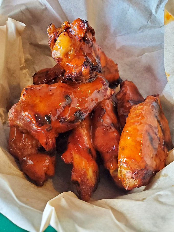 Wings so perfectly glazed they belong in a museum, though they'd never last long enough for anyone to appreciate the exhibit.