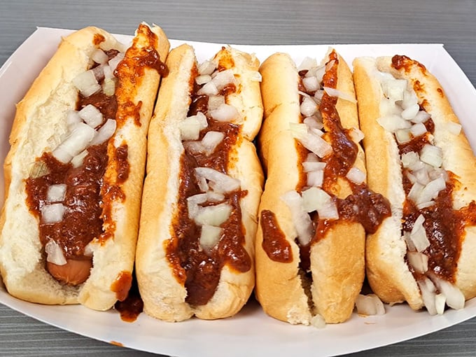Chili dogs wearing their Sunday best – onions and sauce arranged with the precision of a Swiss watchmaker.
