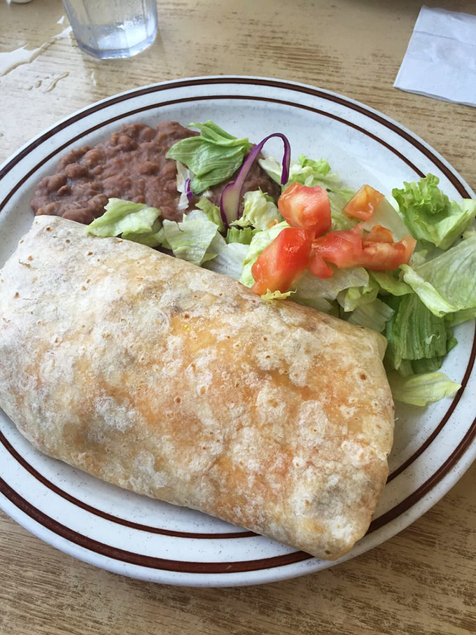 The chorizo burrito delivers hearty satisfaction wrapped in a warm tortilla, perfect for fueling Long Beach adventures.