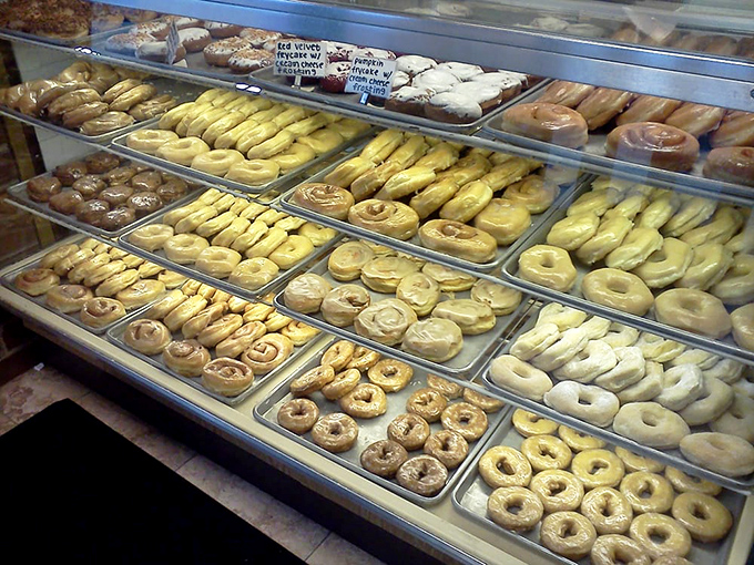 Donut display case that would make Homer Simpson weep with joy – proof that heaven might actually exist on Earth.