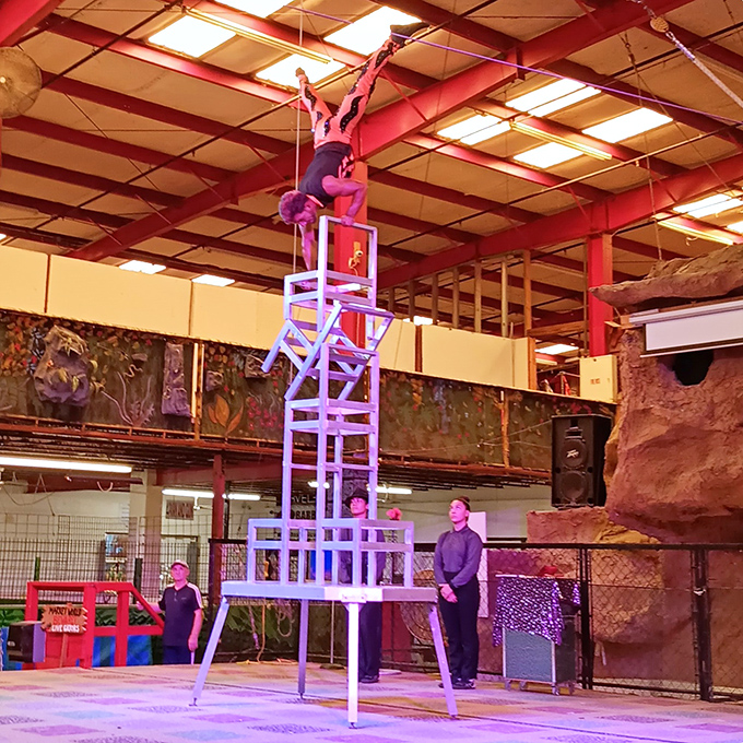 Acrobats defy gravity while shoppers watch in amazement. Who expects circus performances while hunting for bargains? Only at International Market World! 