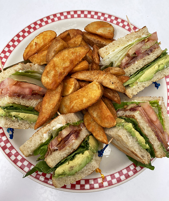 The club sandwich&mdash;architecture you can eat, with layers so perfectly balanced they could teach a master class in structural engineering.
