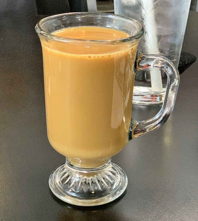 A breakfast spread that proves sometimes the best dining companions are a good cup of coffee and a plate of honest food.