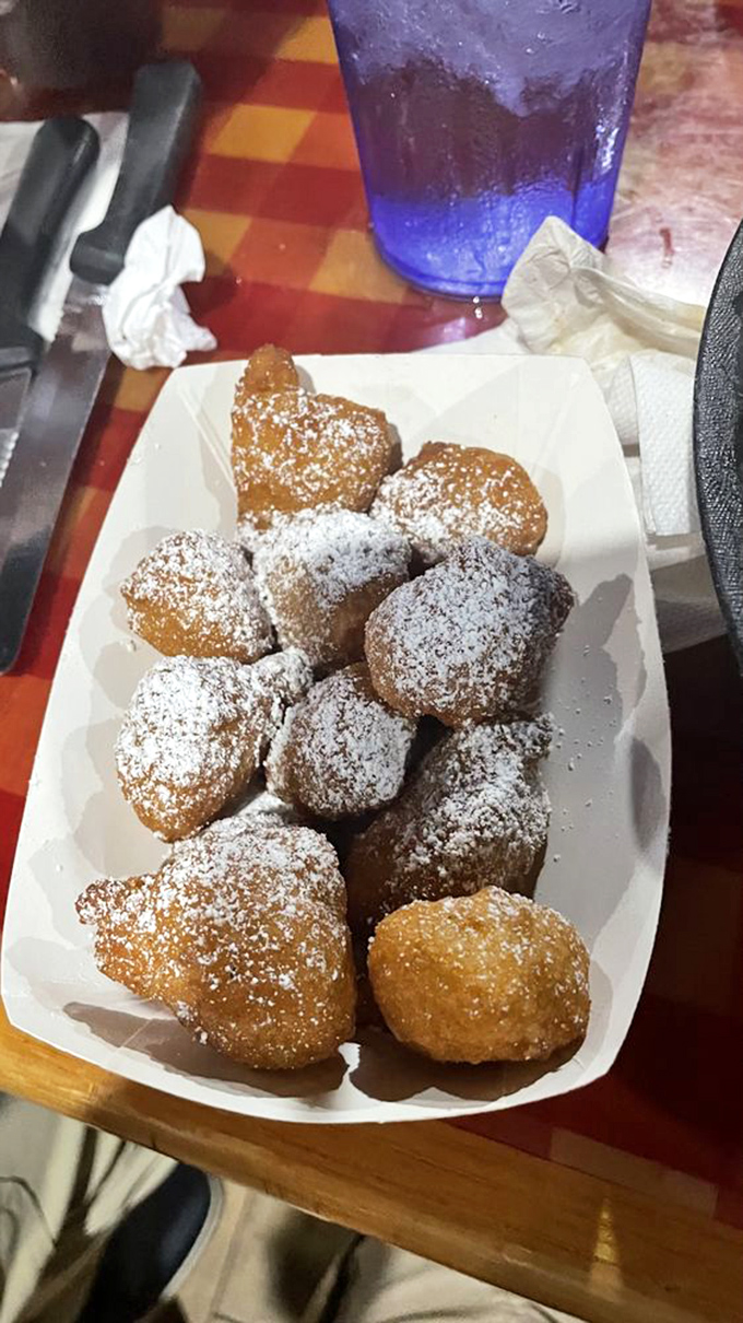 Powdered sugar-dusted fritters that could make even the most dedicated health nut temporarily reconsider their life choices. Sweet temptations worth every calorie.
