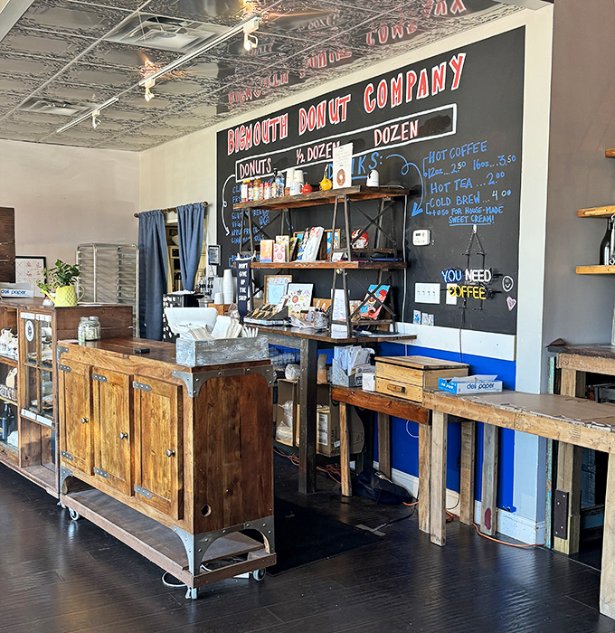 Rustic wooden counters and industrial shelving create a space that feels both modern and timeless&mdash;like donuts themselves.