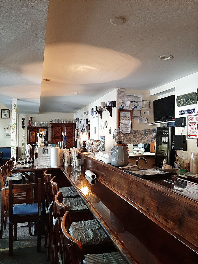 The wooden bar invites patrons to pull up a stool and trade Florida fishing stories for tales of Bavarian beer halls.