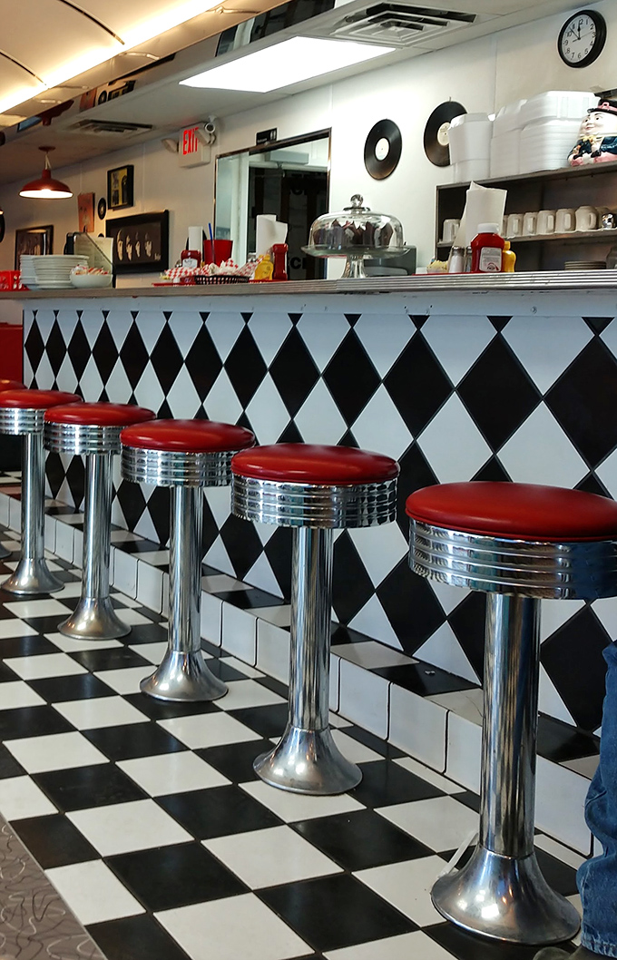 The counter seating&mdash;where solo diners become regulars, and the coffee refills come with a side of local wisdom.