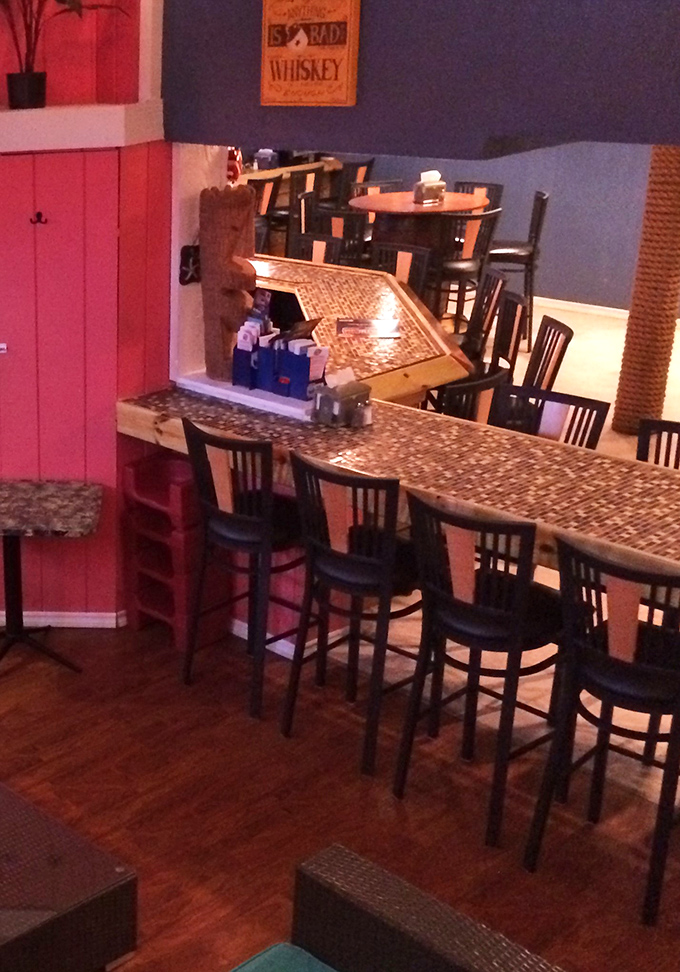 Counter seating where strangers become friends over shared plates and stories worth remembering forever.