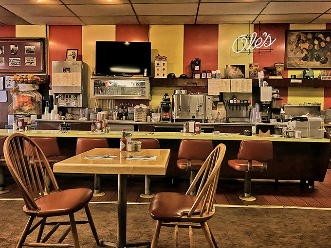 The counter at Ole's: where breakfast dreams come true and coffee cups never reach empty. Front-row seats to the greatest show on earth.