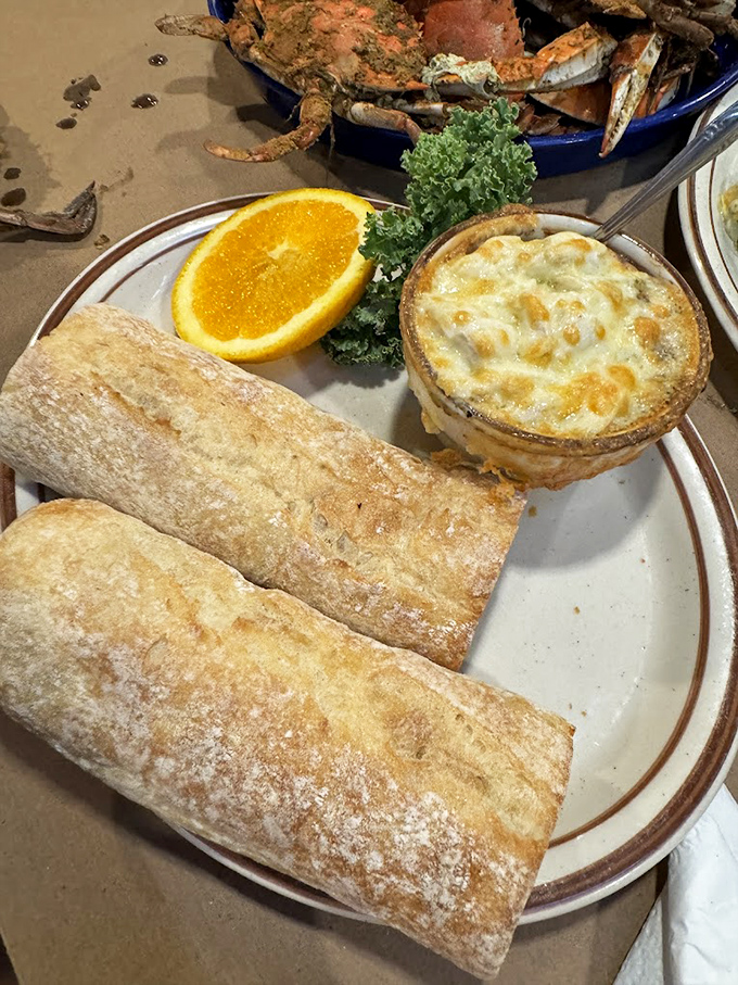 Bubbling crab dip and crusty bread&mdash;the kind of appetizer that makes you consider canceling your entr&eacute;e and ordering three more of these instead.