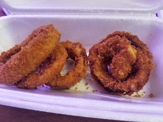 These golden onion rings achieve that perfect crispy-to-tender ratio that defines exceptional preparation and care.