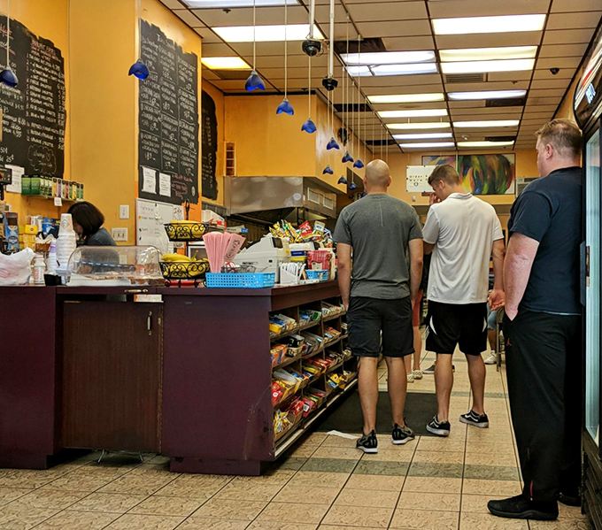 The line forms quickly but moves steadily&mdash;a choreographed dance of hunger, anticipation, and the promise of satisfaction.