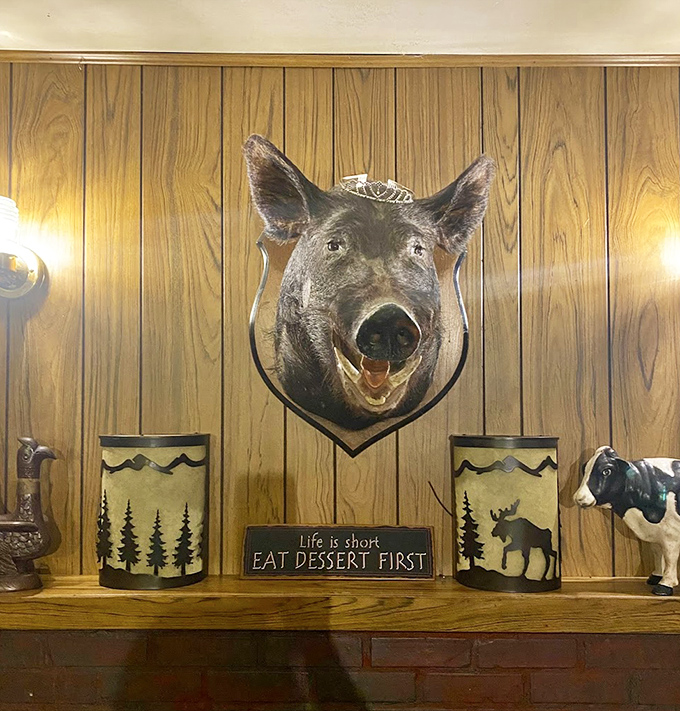 The mounted boar watching over diners seems to say, "Life is short, eat dessert first" &ndash; sage advice from an unexpected source.