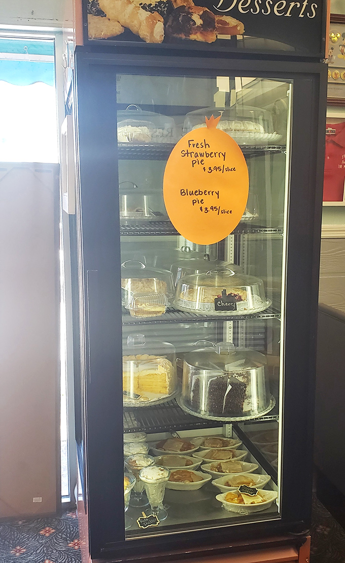 The dessert case—where willpower goes to die. Those homemade pies aren't just desserts; they're edible time machines to your grandmother's kitchen.