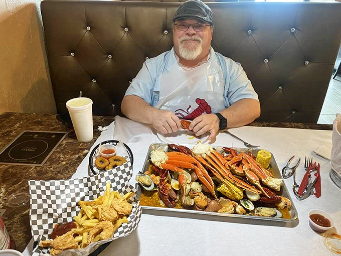 That look of pure joy when the seafood feast arrives—like a kid on Christmas morning, but with crab crackers instead of toys.