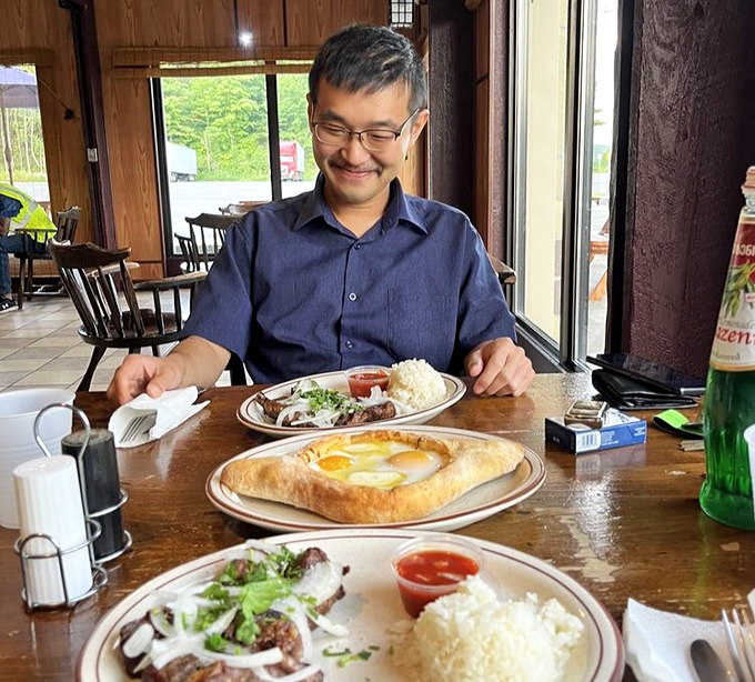 That look of pure joy when the khachapuri arrives at your table. Food that creates facial expressions no Instagram filter could ever replicate.