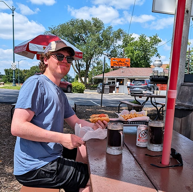 Nothing says "summer in Illinois" quite like enjoying a hot dog and root beer at an outdoor table while the Ace Drive-In sign watches over you.