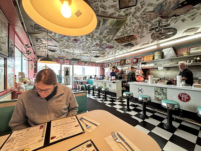 The black and white checkered floor isn't trying to be Instagram-worthy—it was here long before social media, when conversations happened face-to-face over coffee.