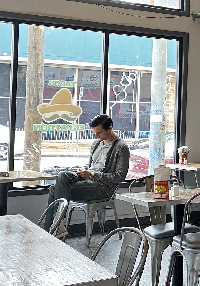 Even waiting becomes a pleasure when anticipation builds for tacos this good. The calm before the flavor storm.