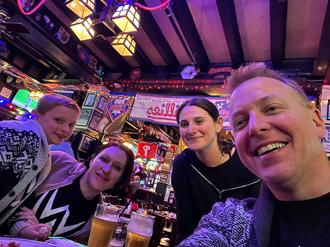 The true McGillin's experience: cold beer, warm smiles, and the unspoken agreement that memories taste better when they're shared.