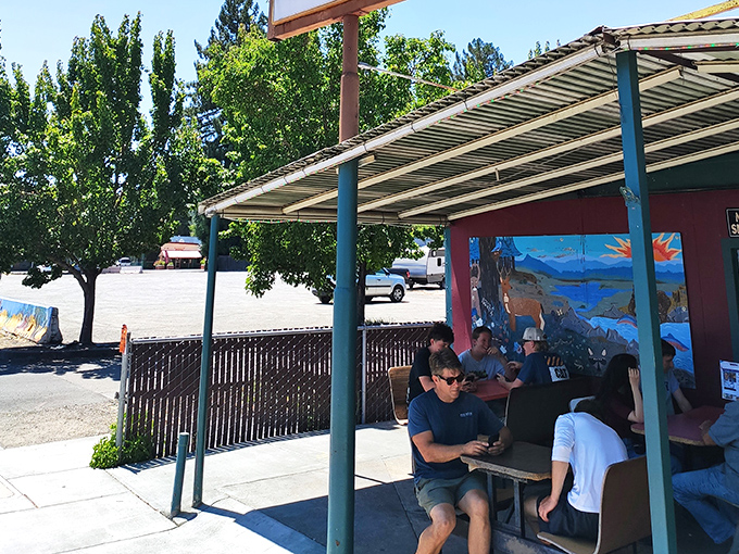 Fellow burger pilgrims gather under the California sun, united by their excellent taste in lunch spots.
